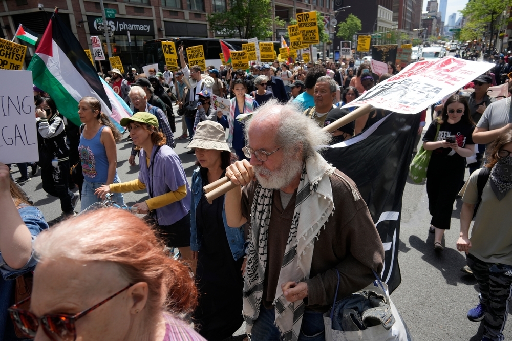 Första maj-protester utmanar Trumps invandrings- och ...